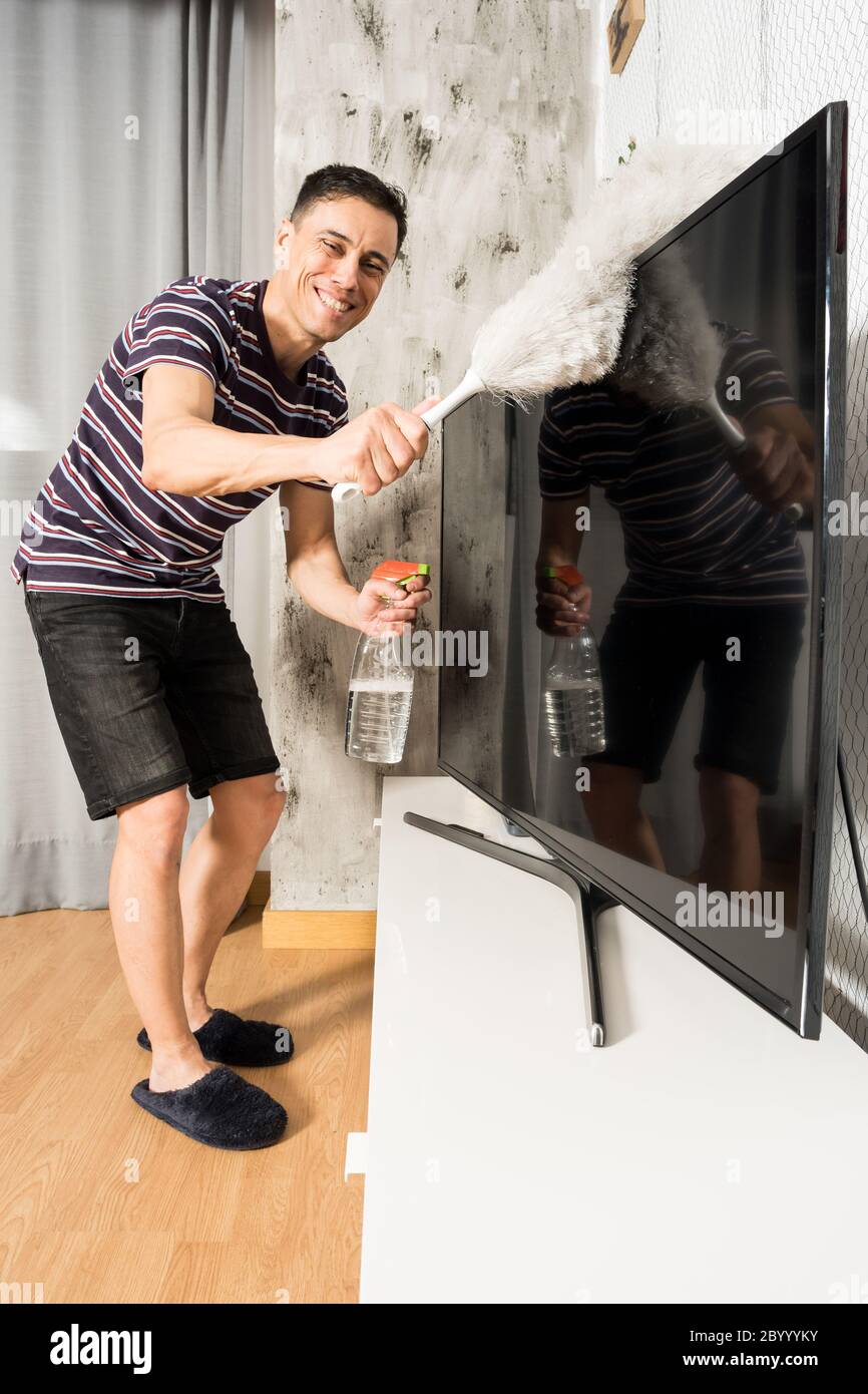 Man with feather duster hi-res stock photography and images - Alamy
