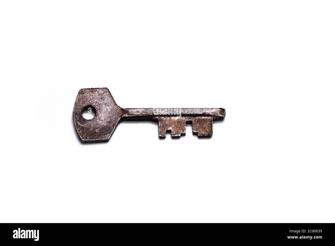 Single old key isolated on white background Stock Photo - Alamy