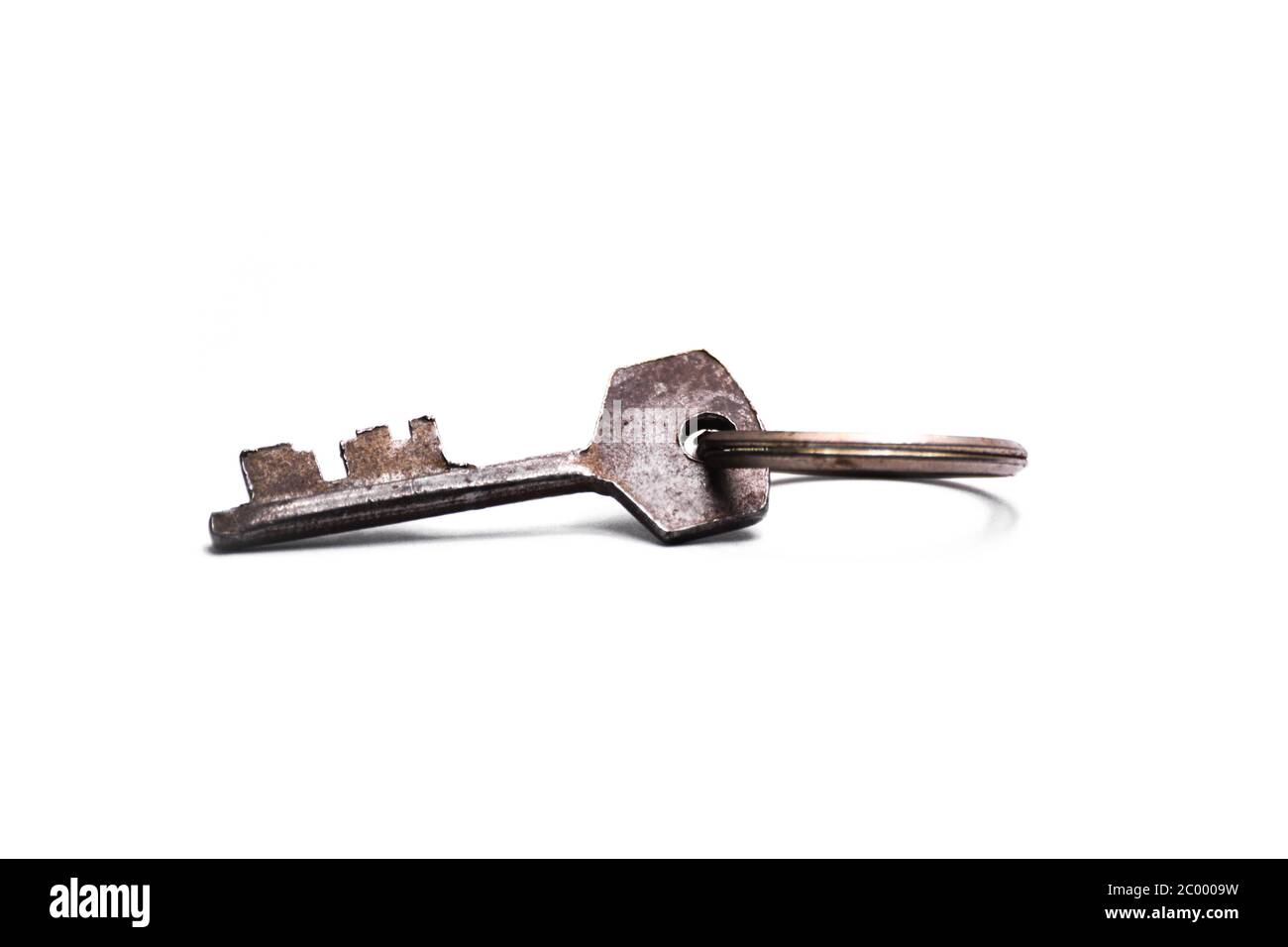 Single old key isolated on white background Stock Photo - Alamy