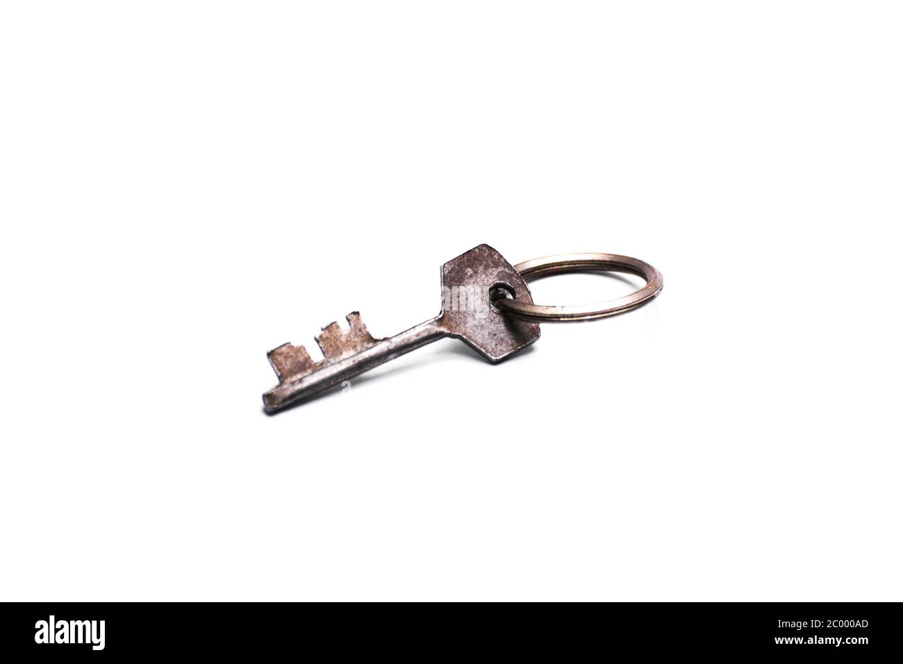 Single old key isolated on white background Stock Photo - Alamy