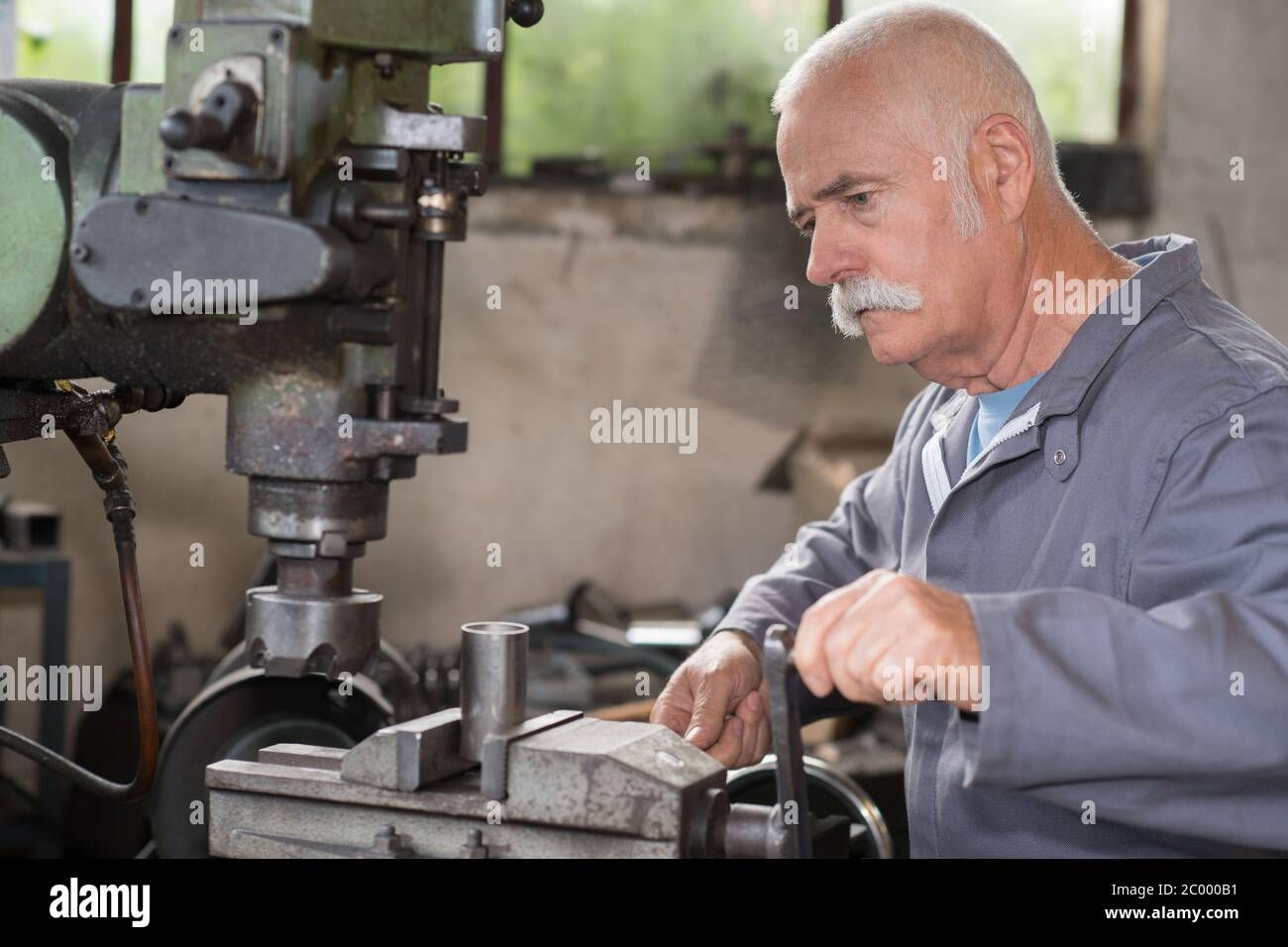 Senior milling machine operator hi-res stock photography and images - Alamy