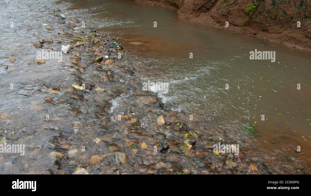 River water flow in the rainy season, looks clear and fresh depicts a ...