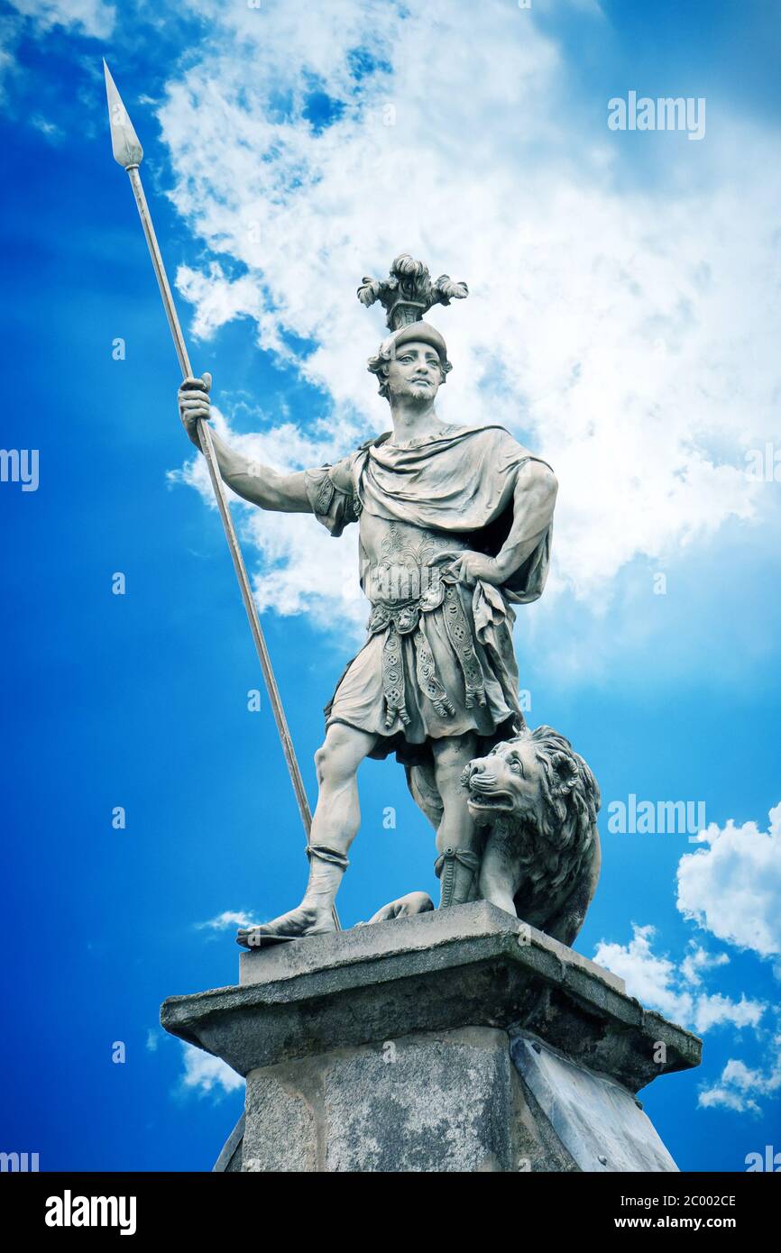 male statue with a lance Stock Photo - Alamy