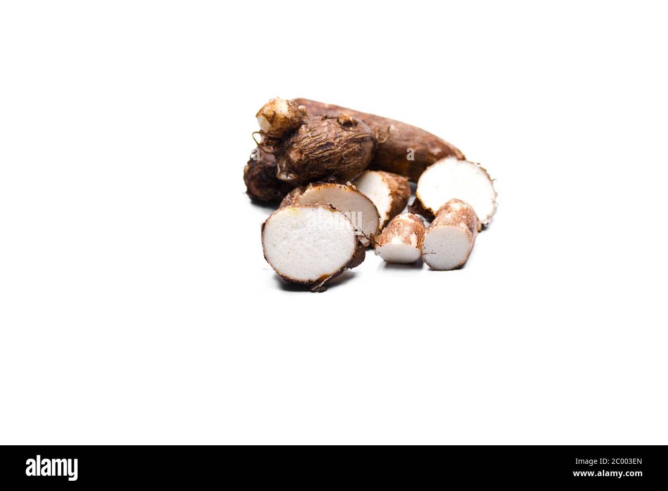 Fresh taro isolated on white background Stock Photo - Alamy