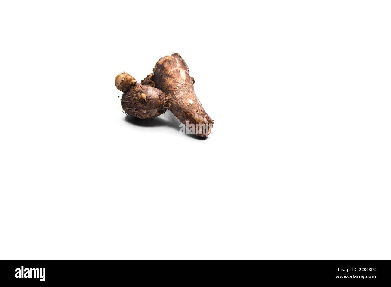 Fresh taro isolated on white background Stock Photo - Alamy