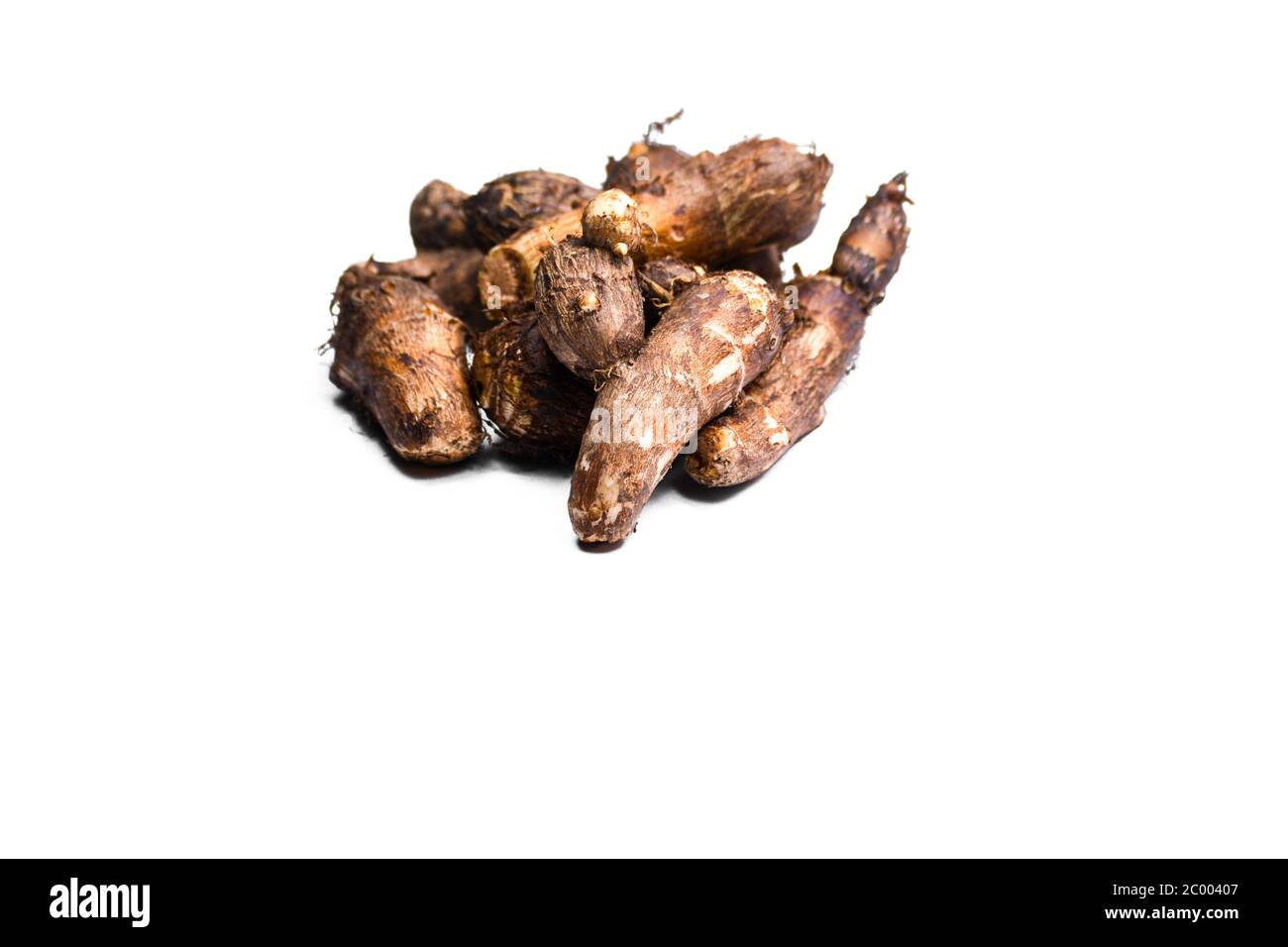 Fresh taro isolated on white background Stock Photo - Alamy