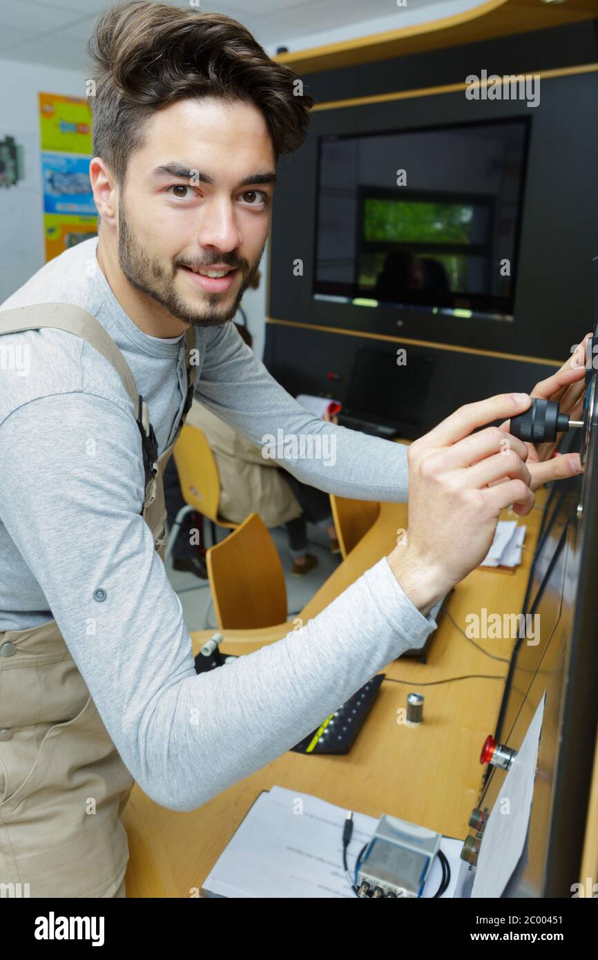 the man is fixing the computer Stock Photo - Alamy