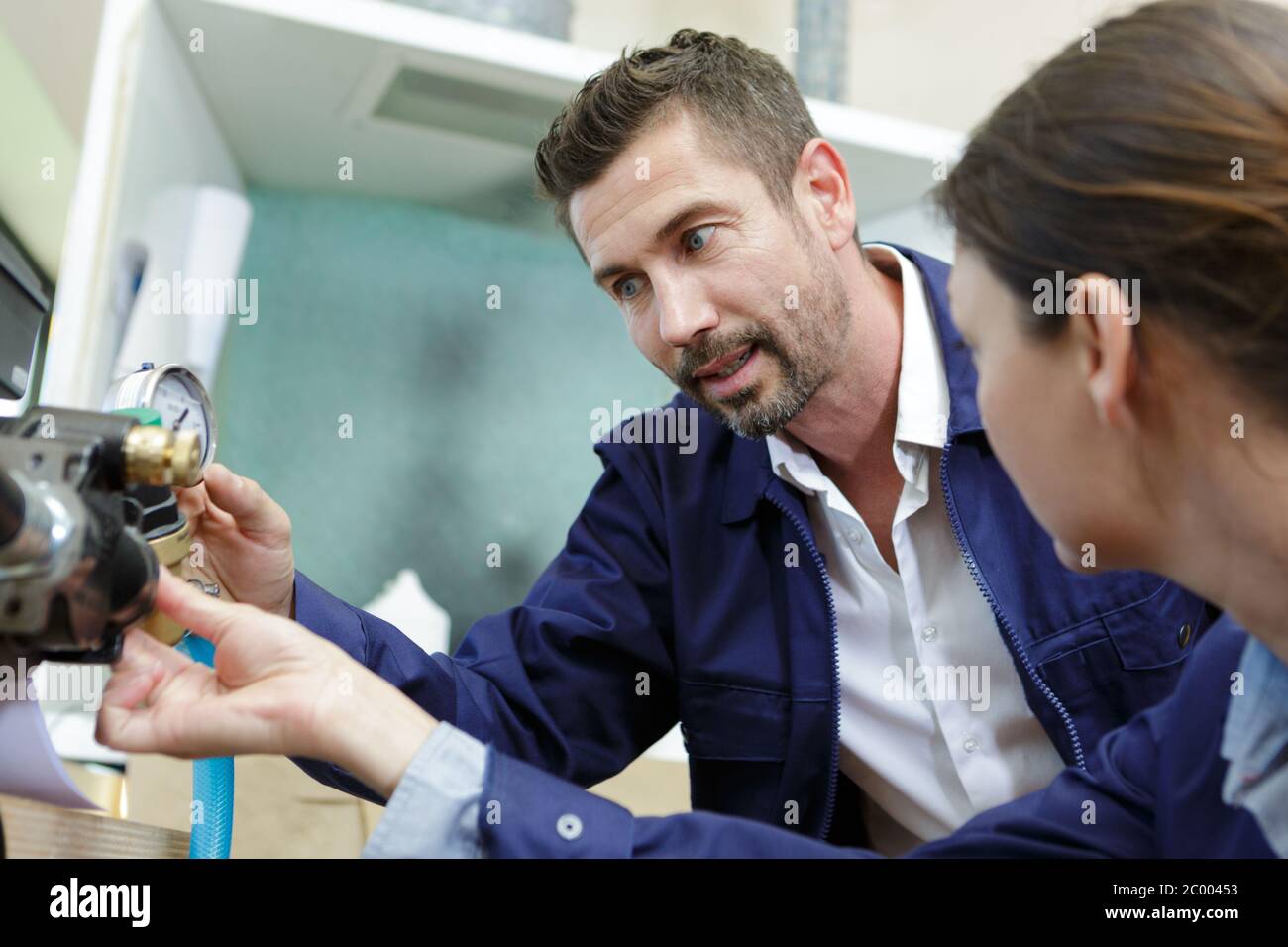 engineering women and men at work Stock Photo - Alamy