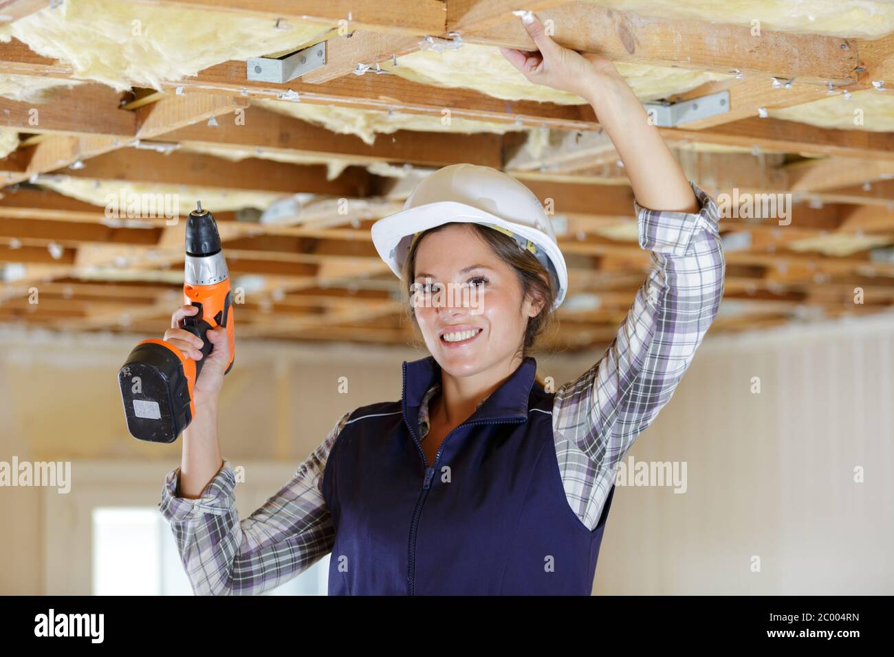 woman installing electrical outlet from the ceiling Stock Photo - Alamy