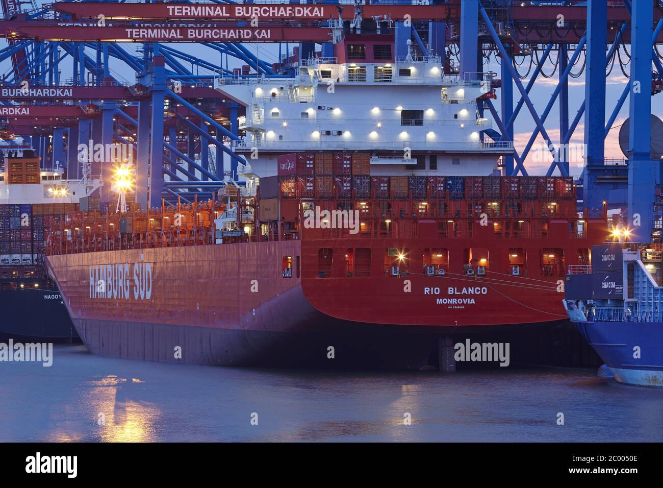 Hamburg - Container ship in the evening Stock Photo - Alamy