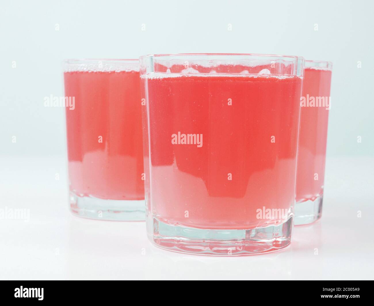 Pink grapefruit juice Stock Photo - Alamy