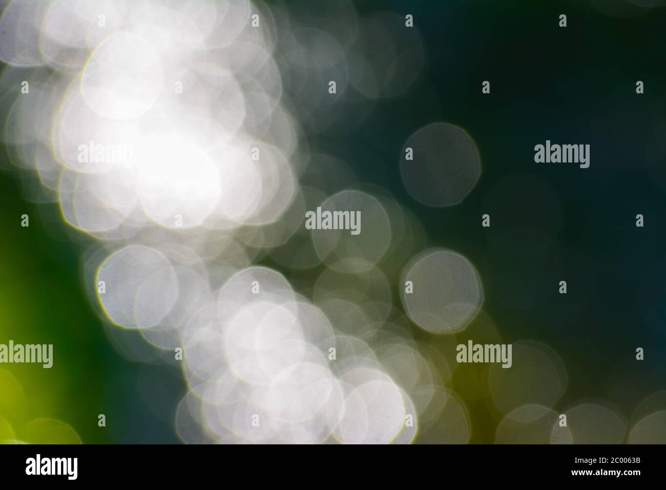 Nature background of sunlight bokeh in morning Stock Photo - Alamy