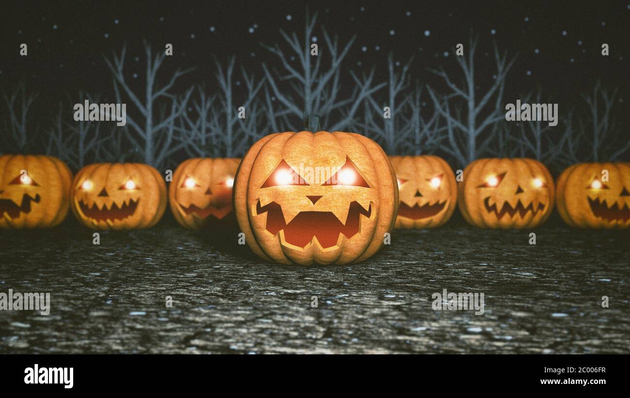 Spooky pumpkins on the background of trees without leaves. Scary dark ...