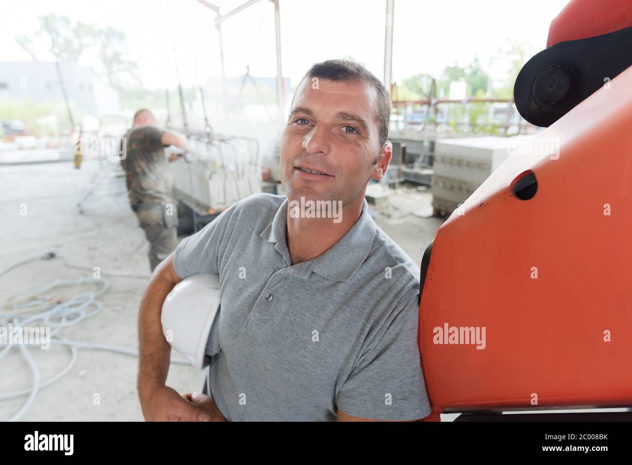 the cement factory worker posing Stock Photo - Alamy