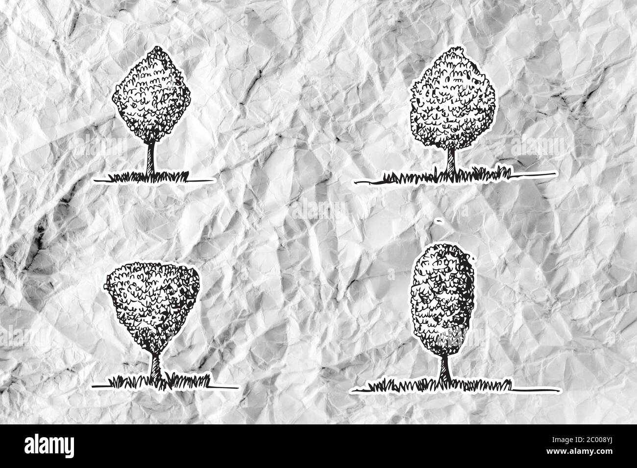 Set of trees with leaves on crumpled paper Stock Photo - Alamy