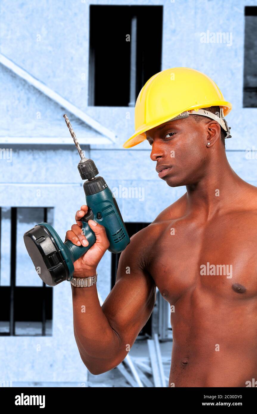 Construction Worker with Drill Stock Photo - Alamy