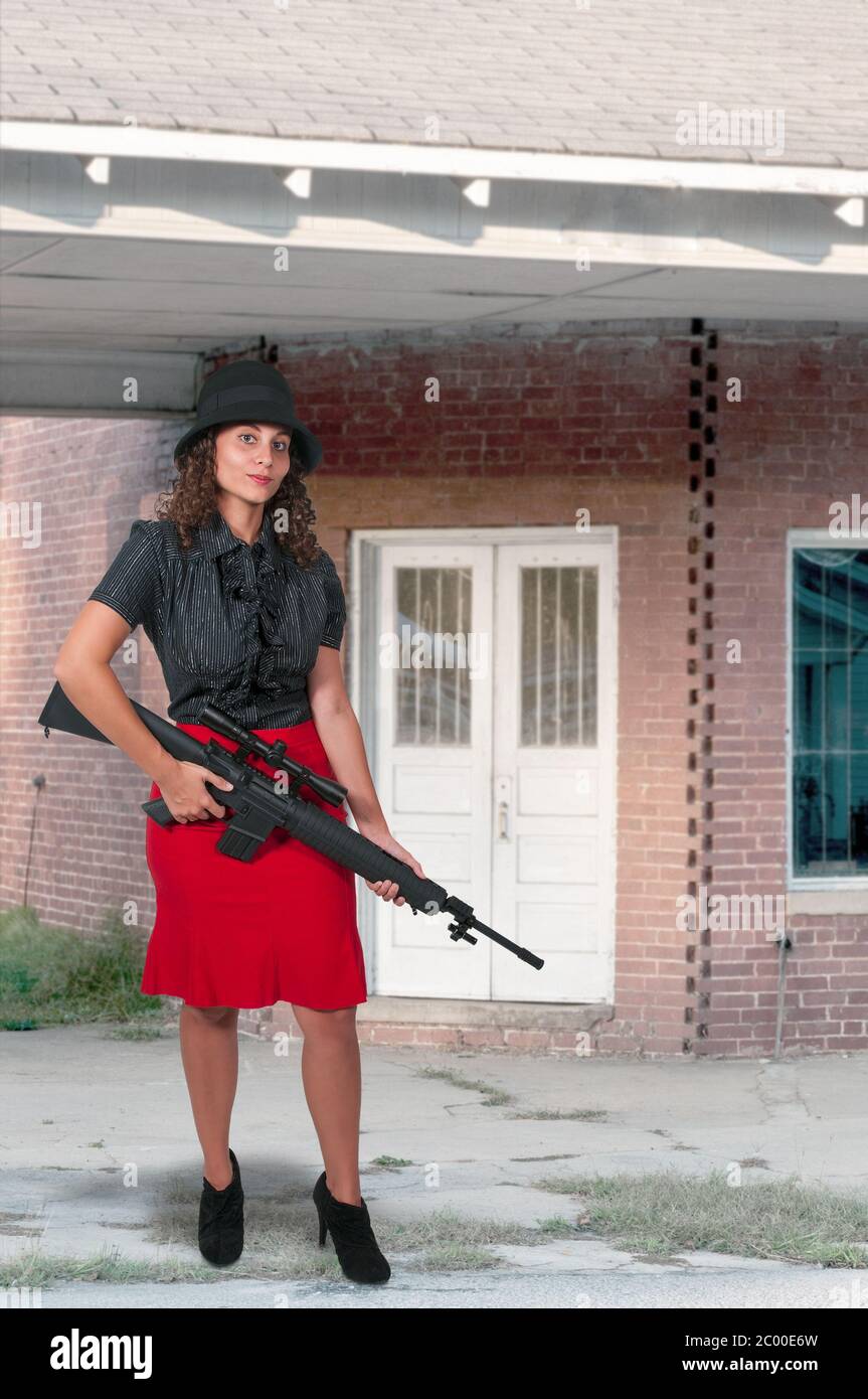 Woman with Assault Rifle Stock Photo - Alamy