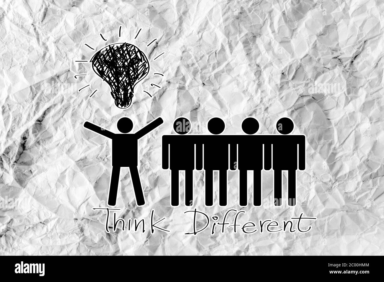 people icons think different idea design on crumpled paper Stock Photo ...