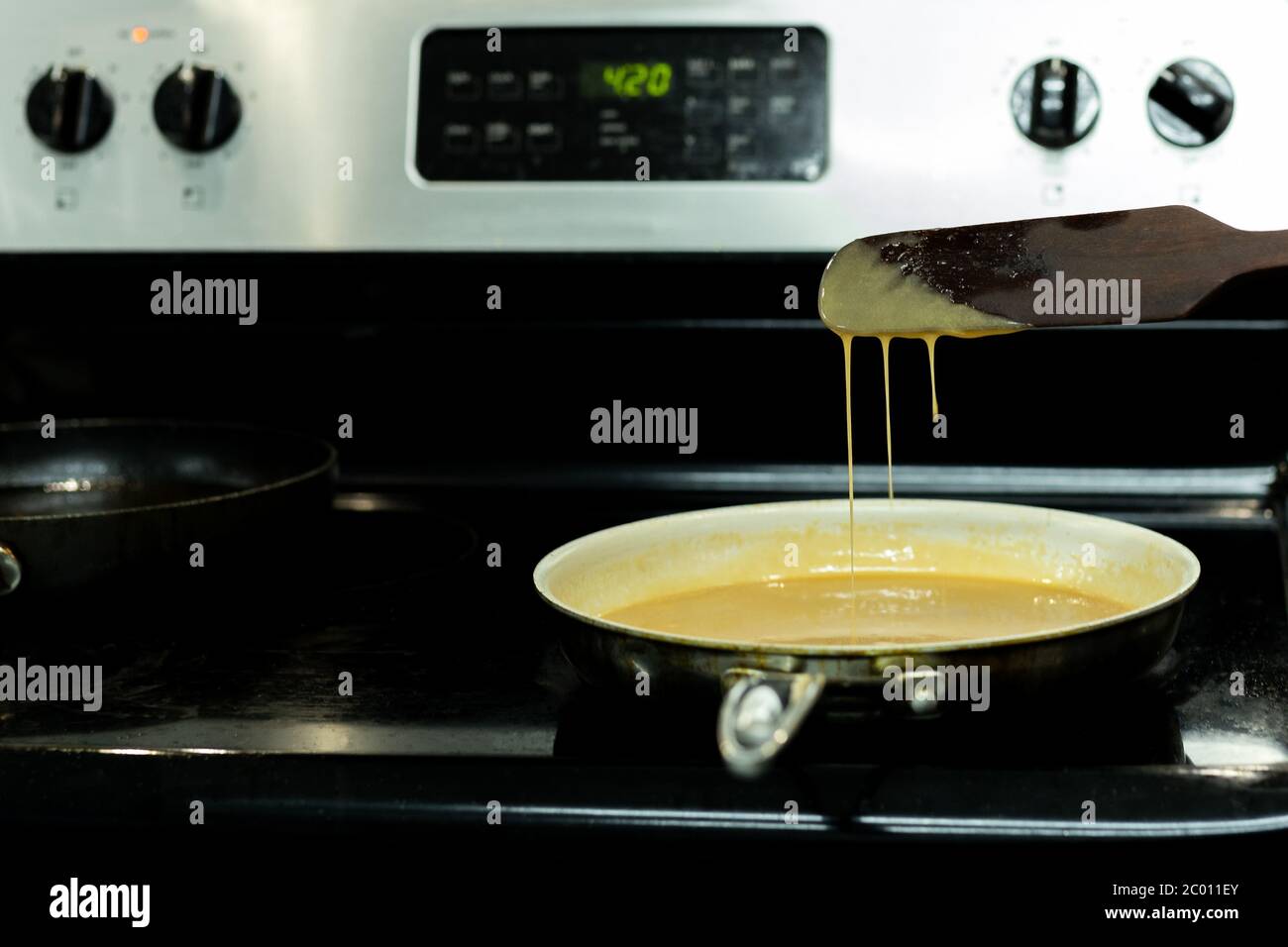 Homemade caramel cooking Process in frying pan Stock Photo - Alamy