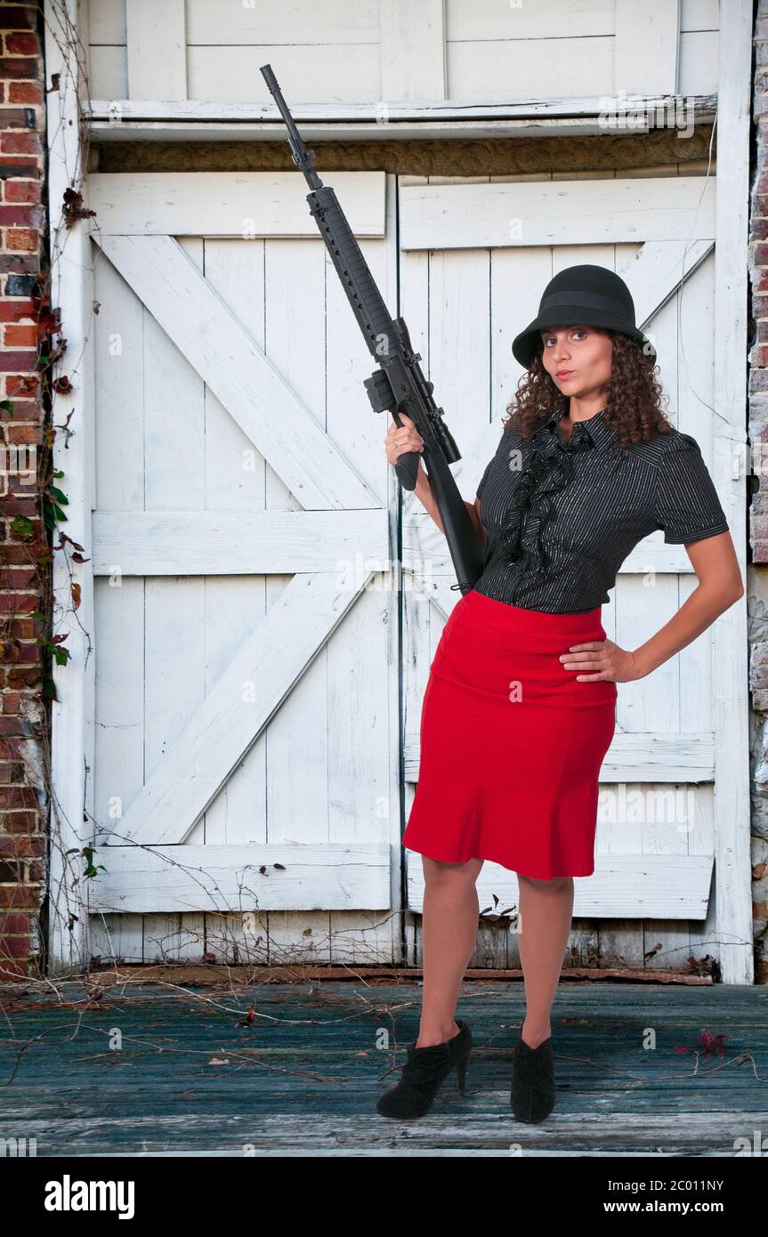 Woman with Assault Rifle Stock Photo - Alamy