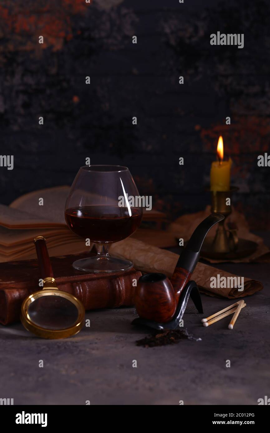 still life with a pipe for smoking and alcohol men's history Stock ...