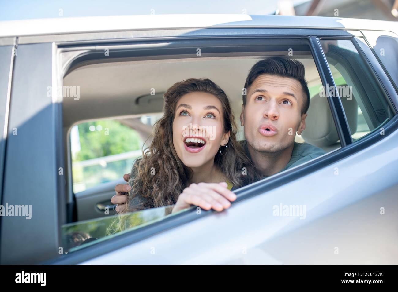 Girl looking out open car hi-res stock photography and images - Alamy