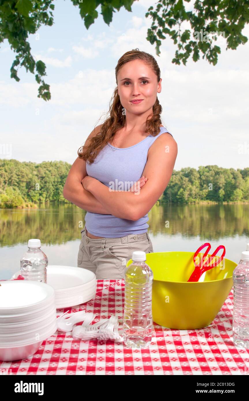 Woman at picnic table hi-res stock photography and images - Alamy