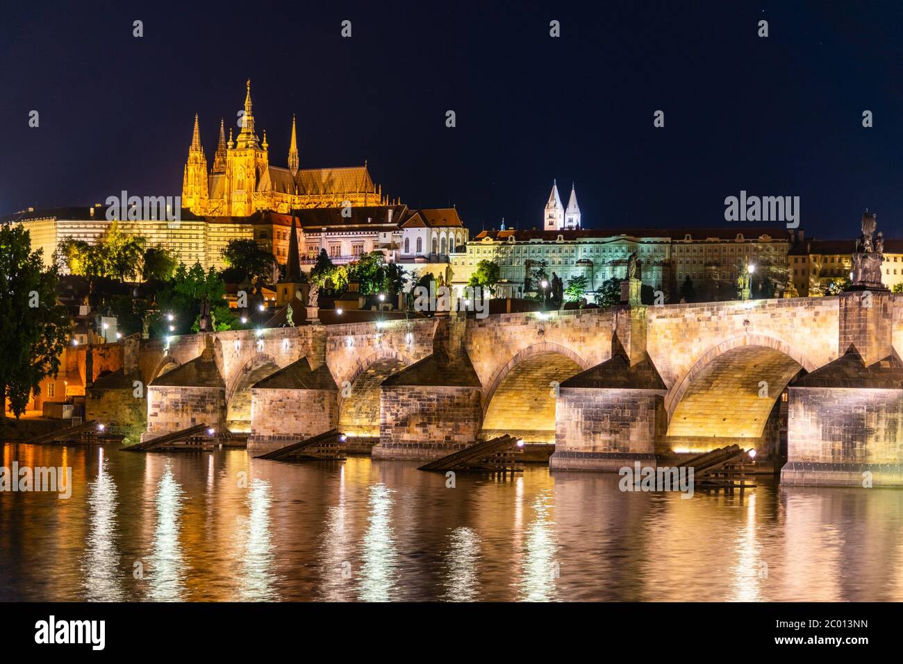 Prague night panorama. Prague Castle and Charles Bridge above Vltava River, Praha, Czech ...