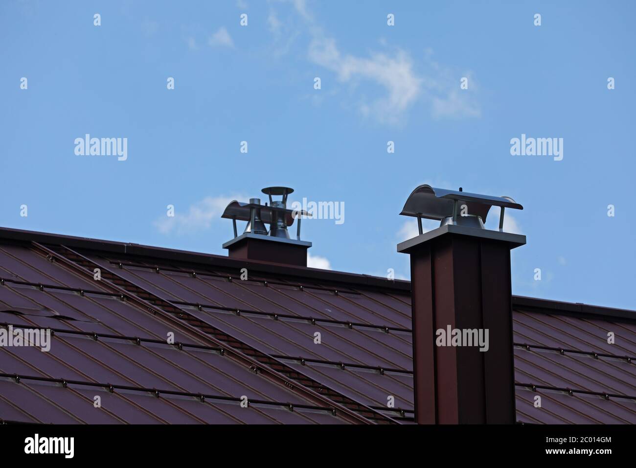 Chimney on a house roof Stock Photo - Alamy