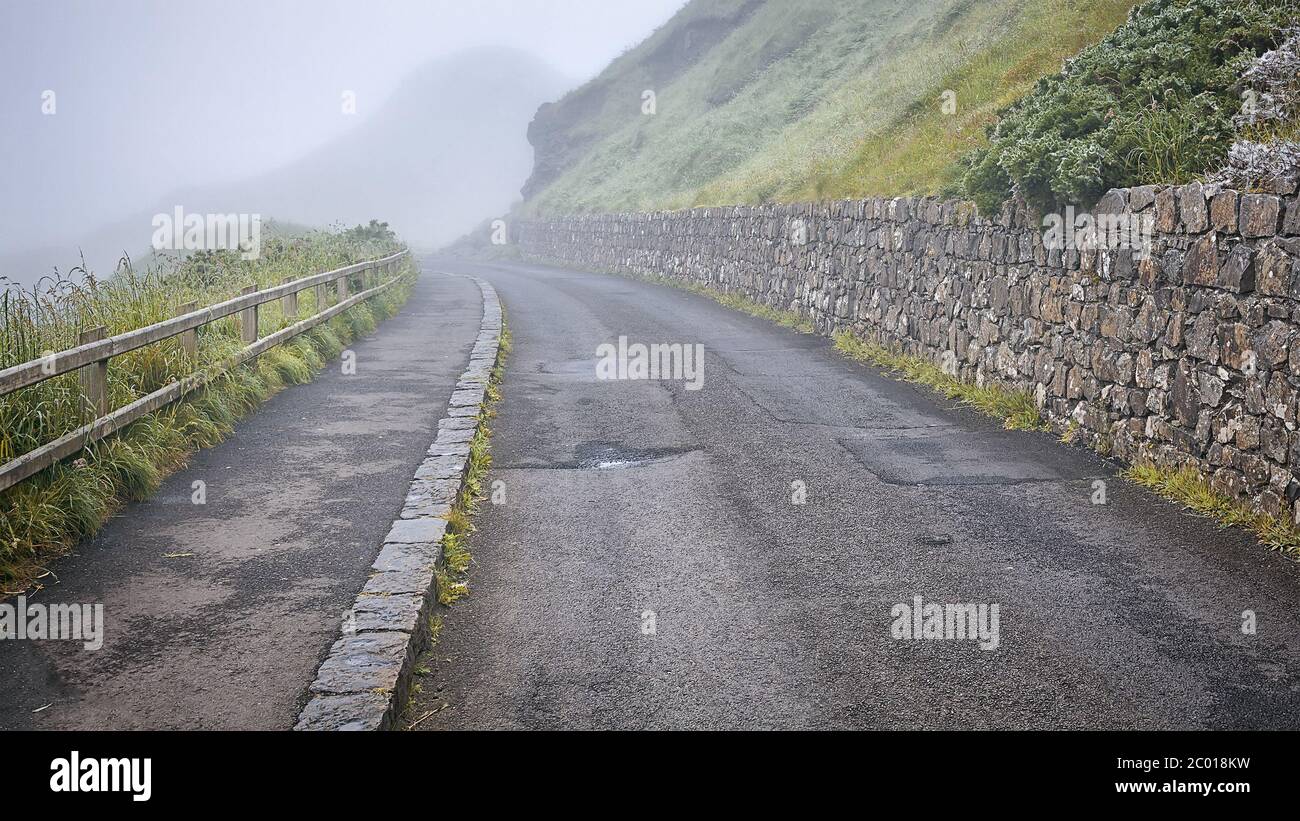 road in mist Stock Photo - Alamy