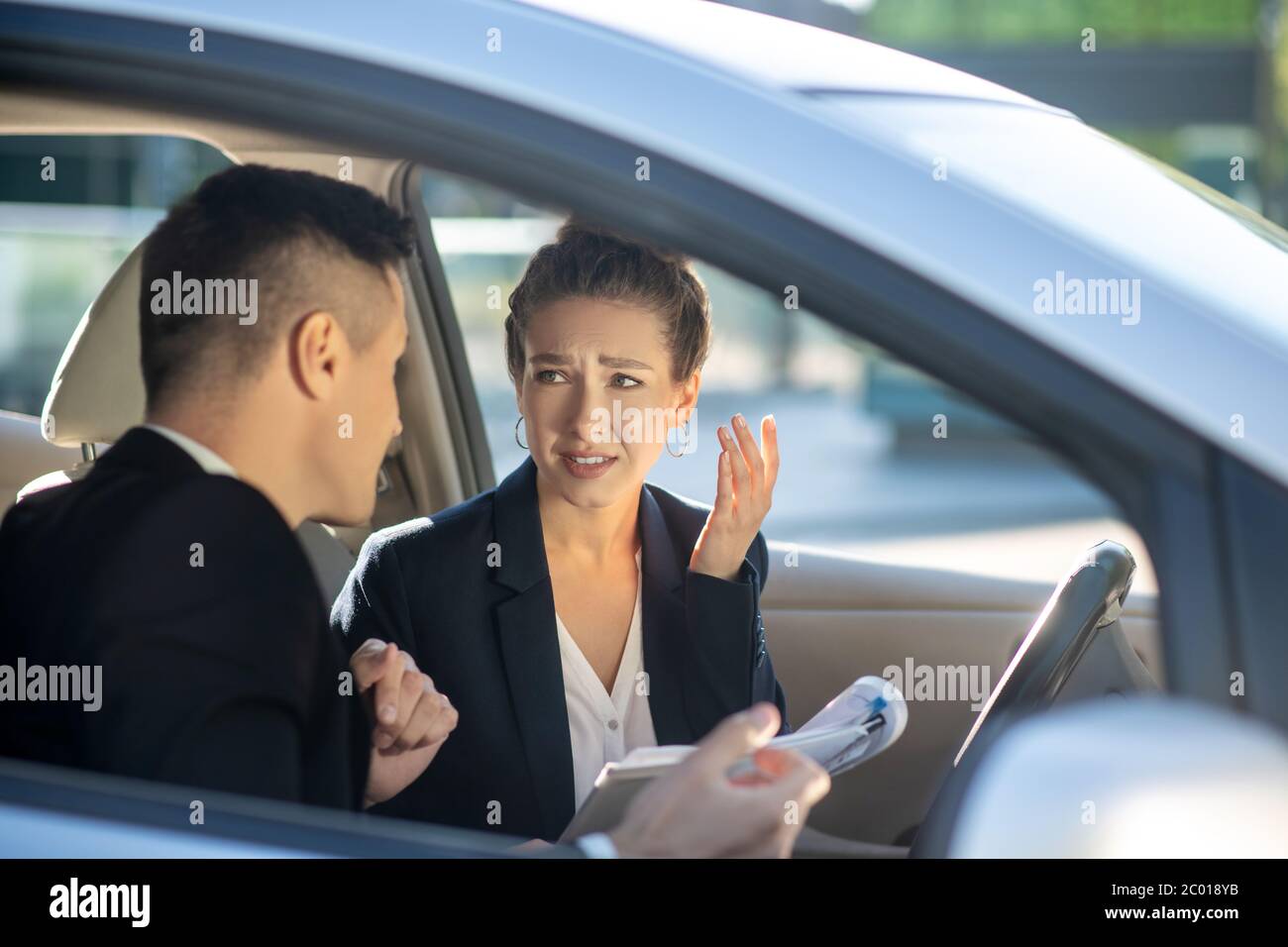 Businessman in car discussing hi-res stock photography and images - Alamy