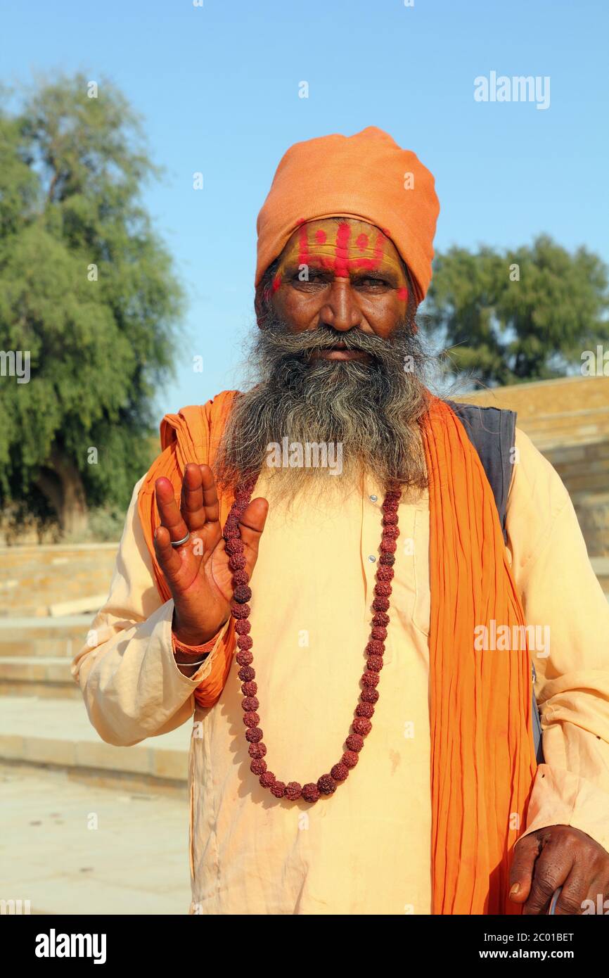 Holy Sadhu men with traditional painted face in India Stock Photo - Alamy