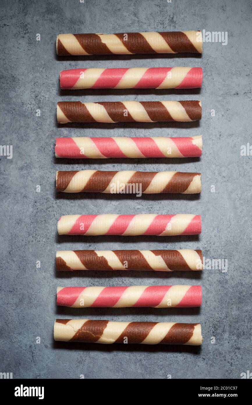Wafer rolls on a stone table Stock Photo - Alamy