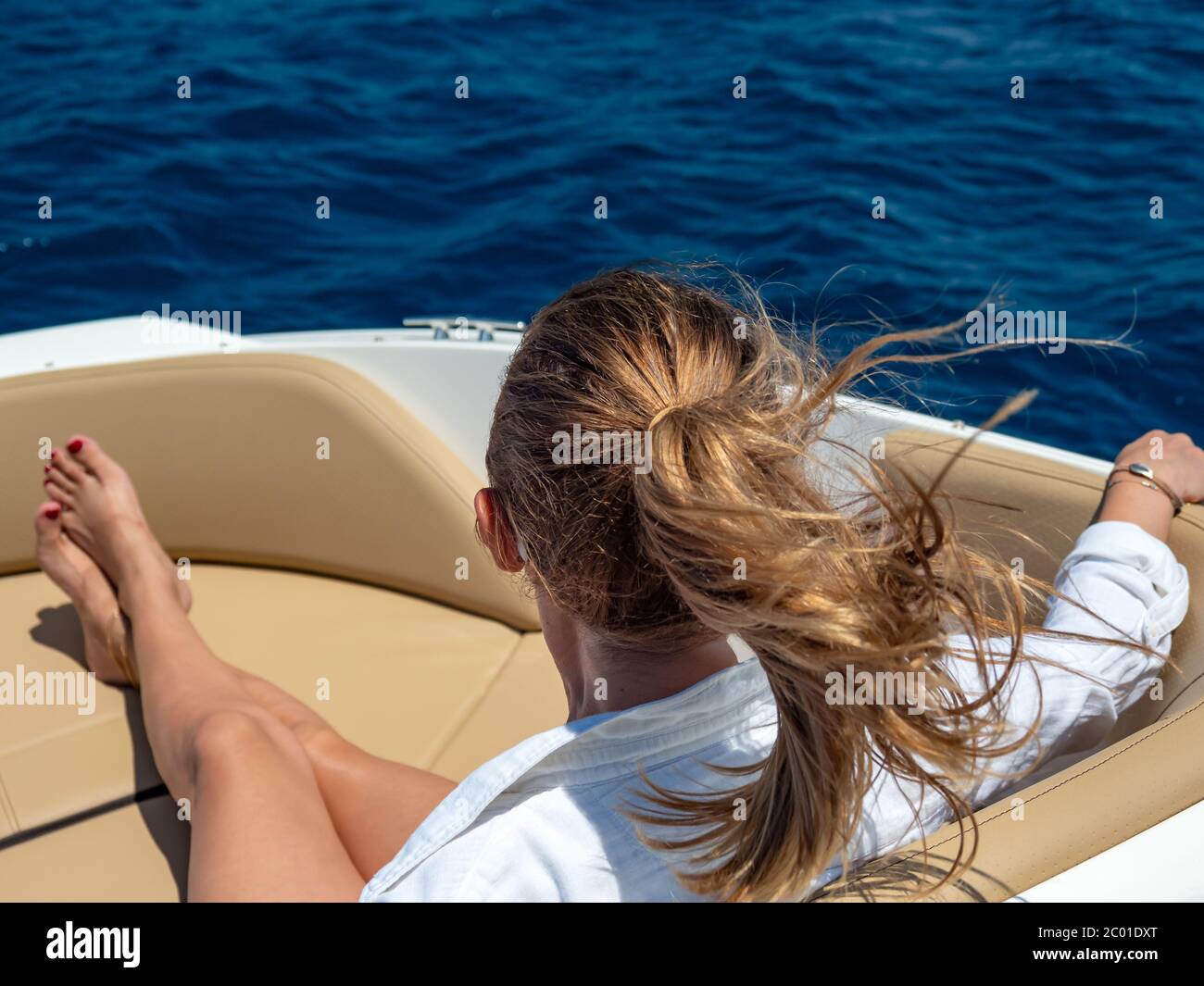 Girl driving speedboat hi-res stock photography and images - Alamy