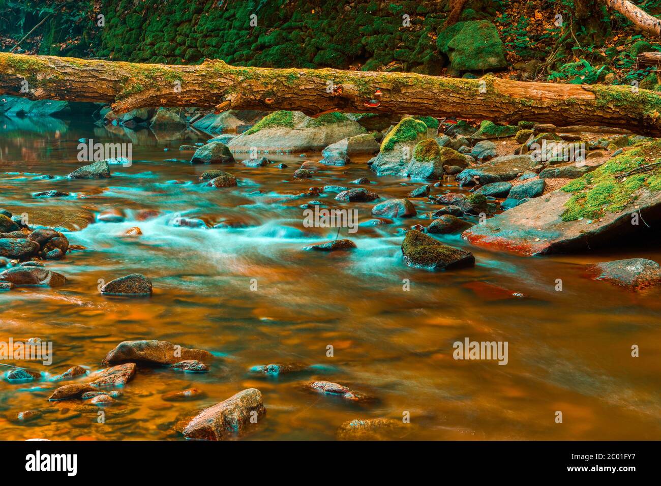 Nature scene featuring water streaming through river bedrock Stock ...