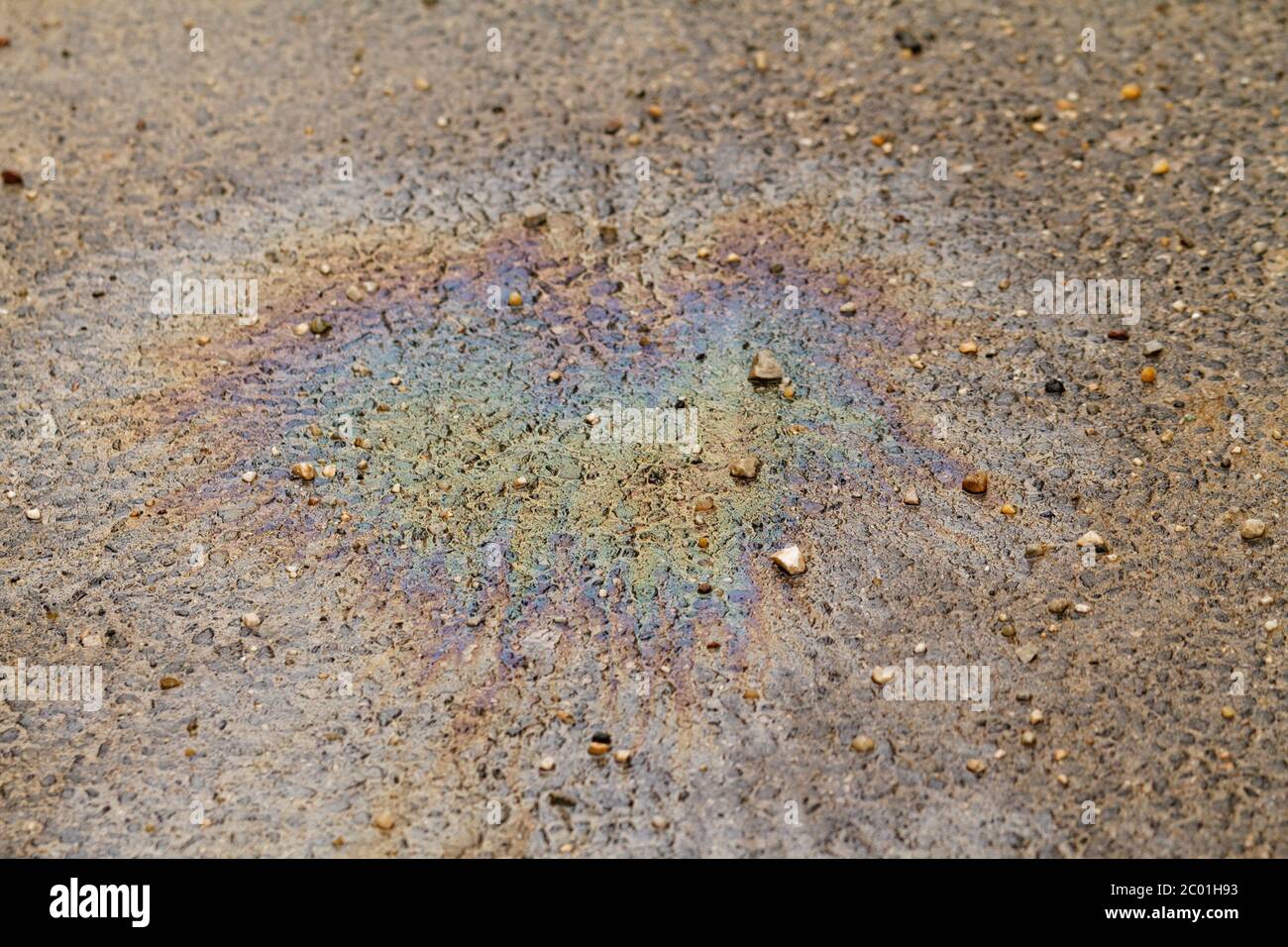 Photo of colorful oil spill on the road Stock Photo - Alamy