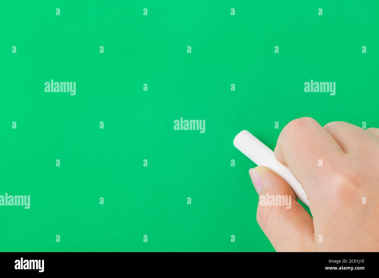 Hand with chalk writing on blackboard Stock Photo - Alamy
