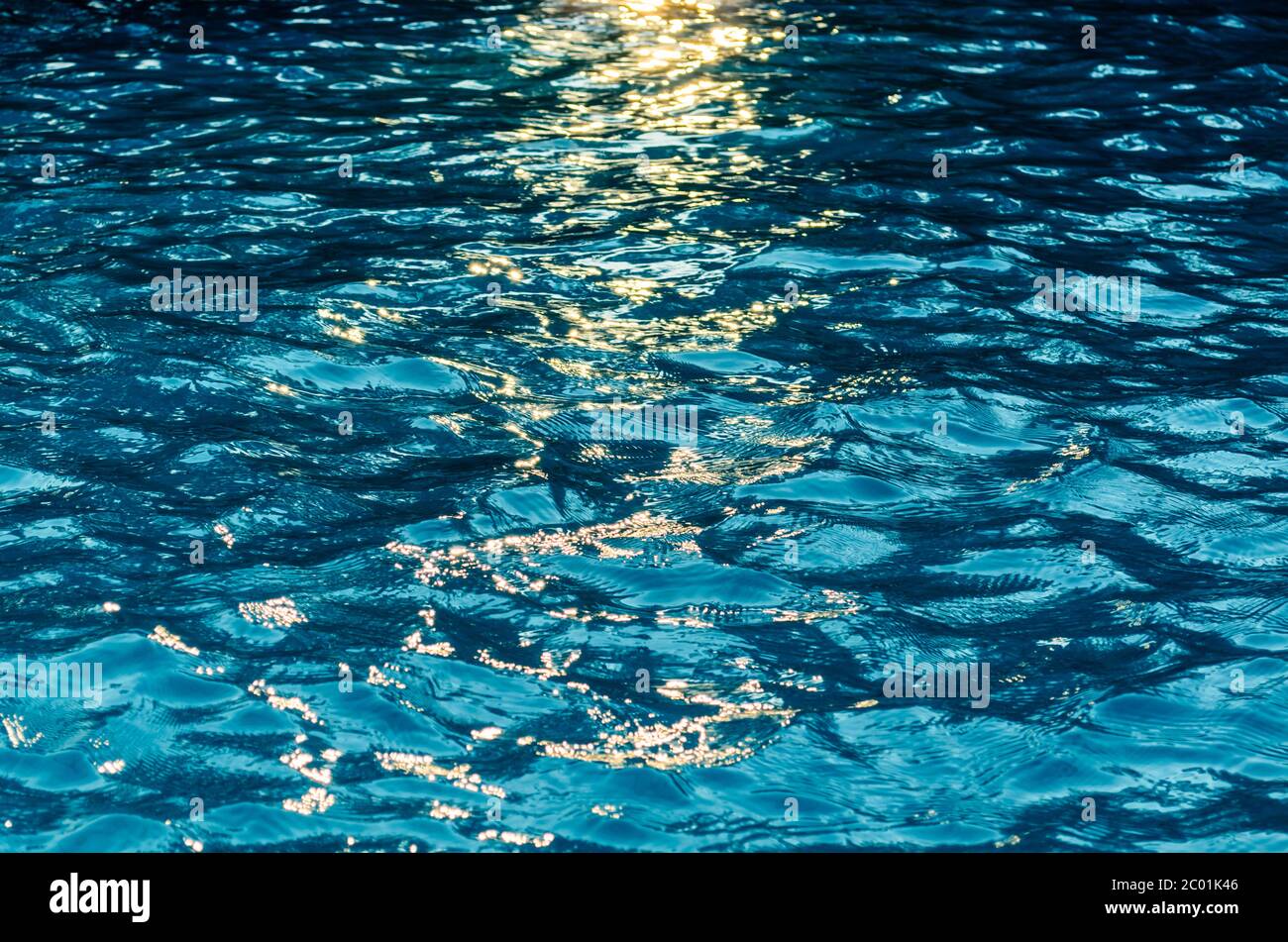 Blue water surface that reflects light Stock Photo - Alamy
