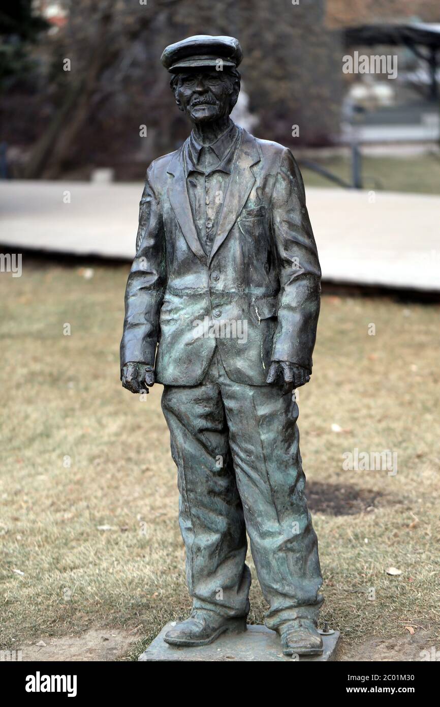 Statue of working Stock Photo - Alamy