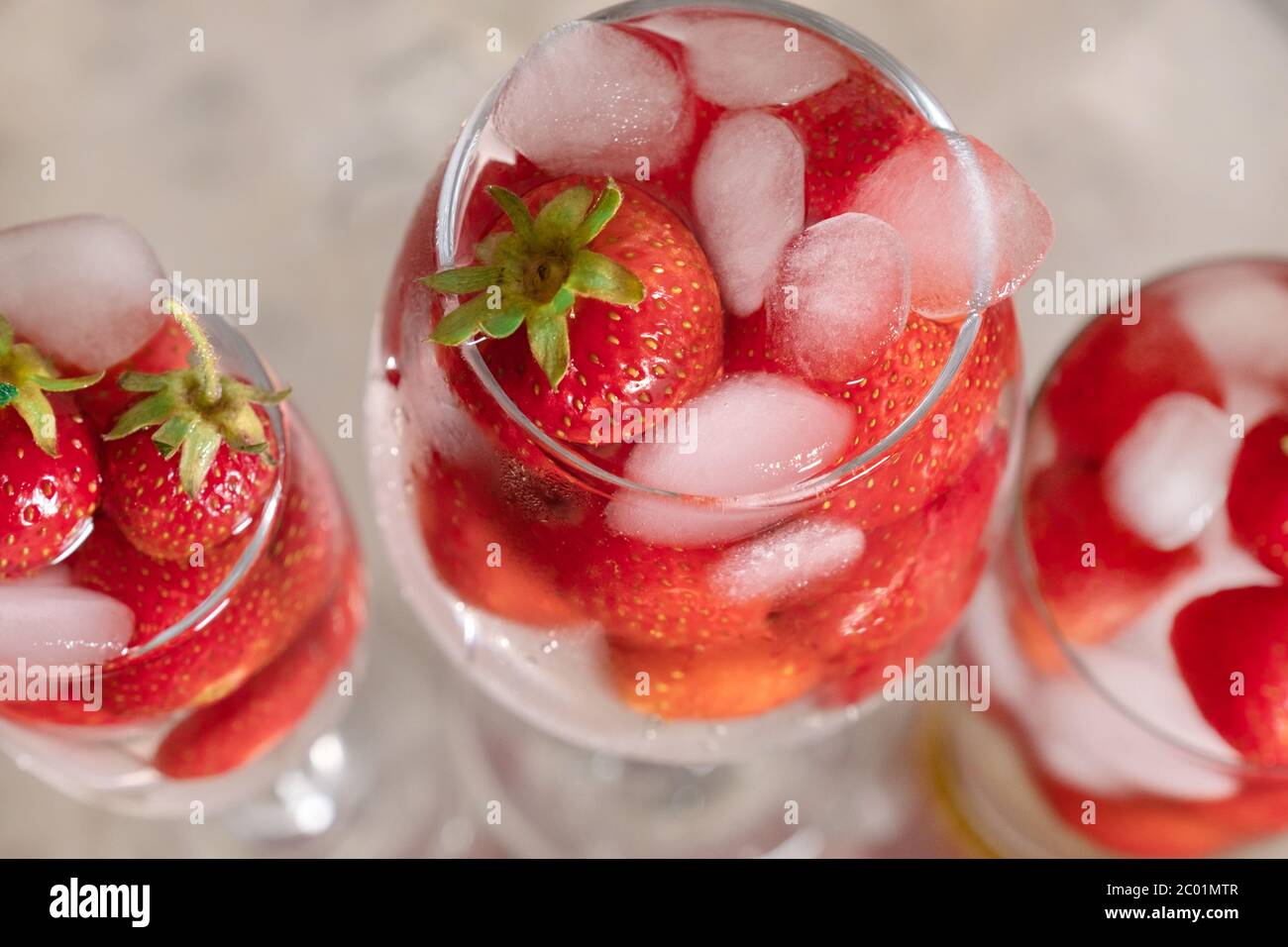 Strawberry Cold Drink with Ice in Glass on White Background with ...