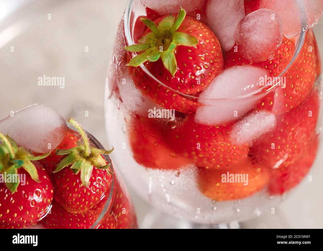 Strawberry Cold Drink with Ice in Glass on White Background with ...