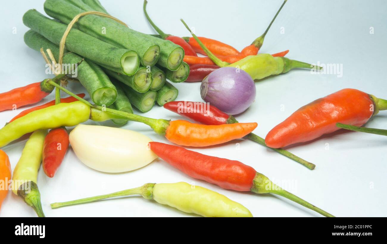 Red chili, garlic, onion and a bunch of string beans. Natural ...