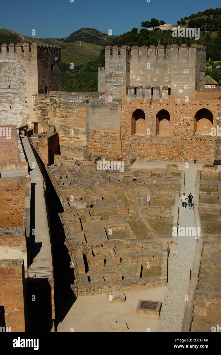 Towers walls and fortifications of the Alhambra on a hot sunny day ...