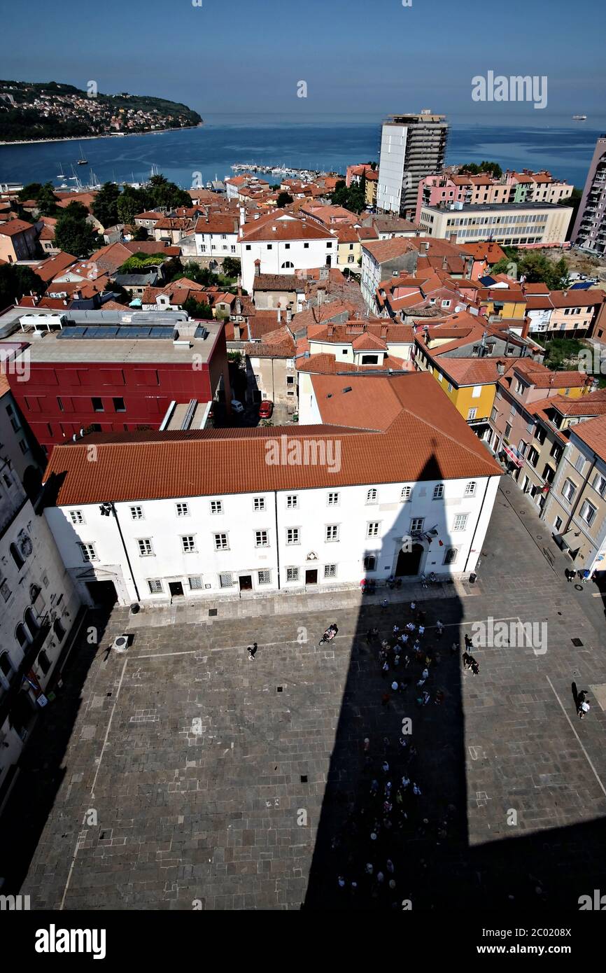aerial view of Tito square with the shadow of the tower in Koper ...