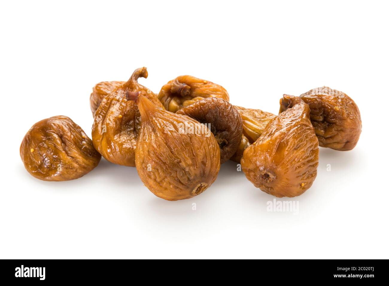 Preserved fruit. Group of dried figs isolated on white background Stock ...