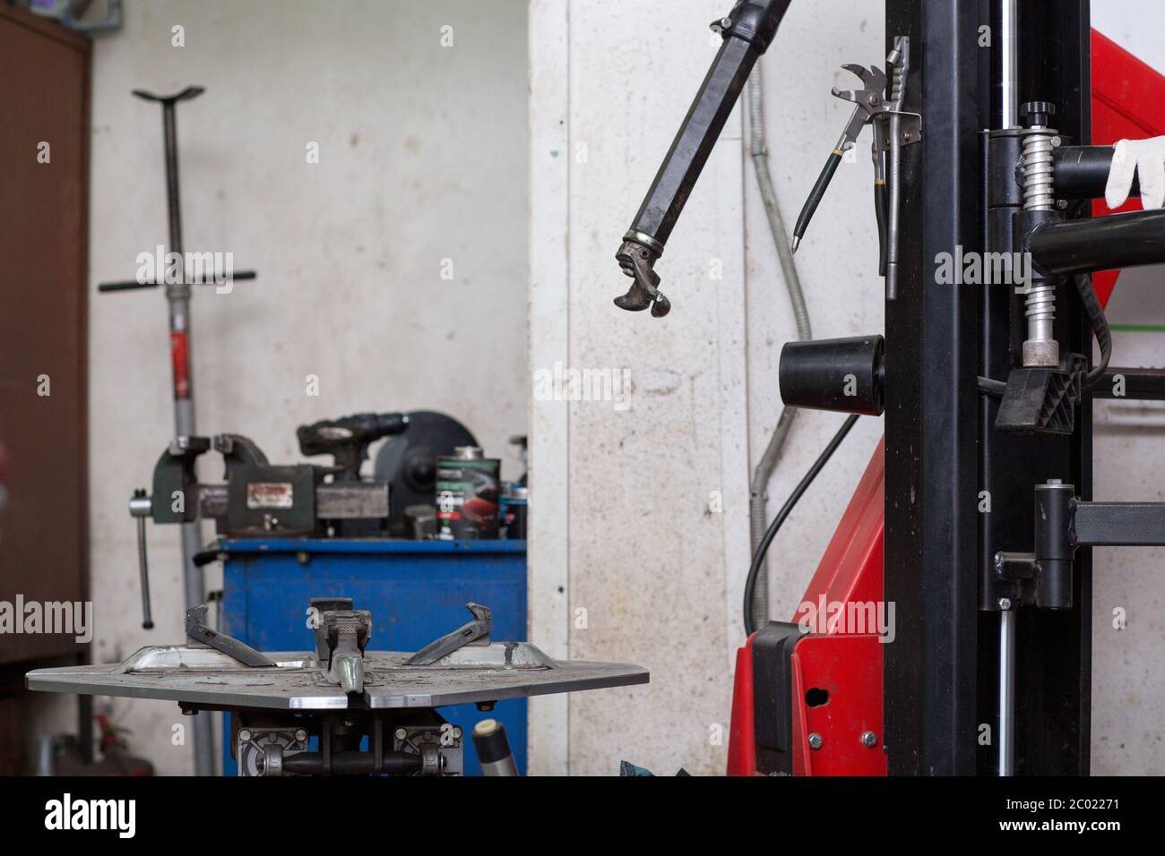 Machine for changing car tire fitting. Wheel tyre repairing Stock Photo ...