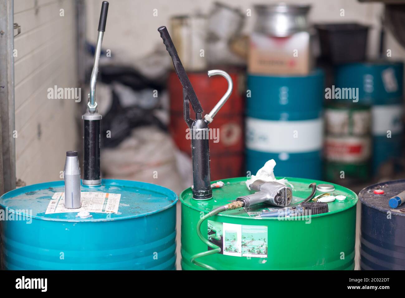 Service station. Oil Barrel for car engine Stock Photo - Alamy