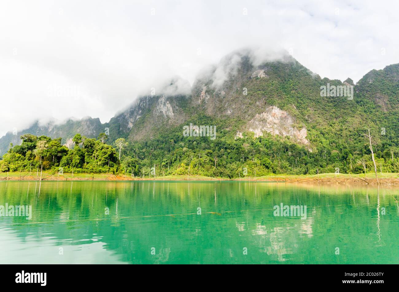 Beautiful green river and mountains Stock Photo - Alamy