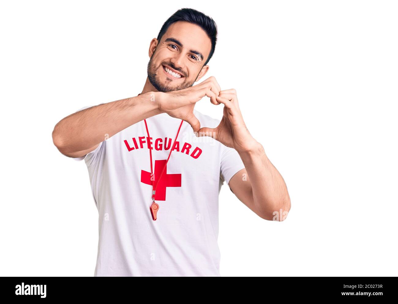 Young handsome man wearing lifeguard uniform smiling in love doing ...