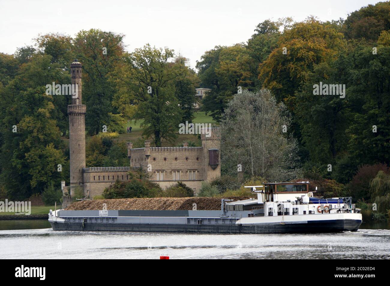 Inland vessel in front of the steam engine house Stock Photo - Alamy